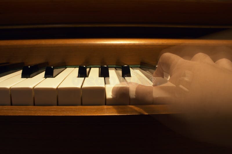 One Hand Playing the Piano stock image. Image of recital - 212973
