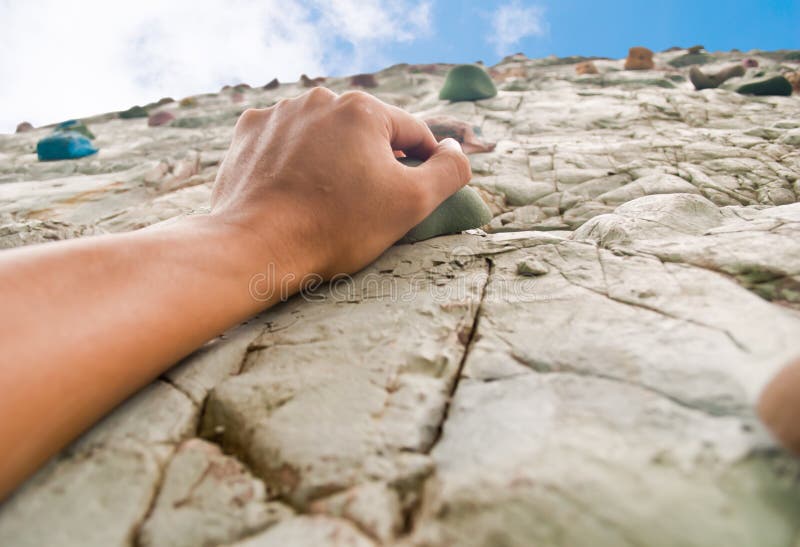 Climbing hand grip on rock stock image. Image of cliff - 23995239