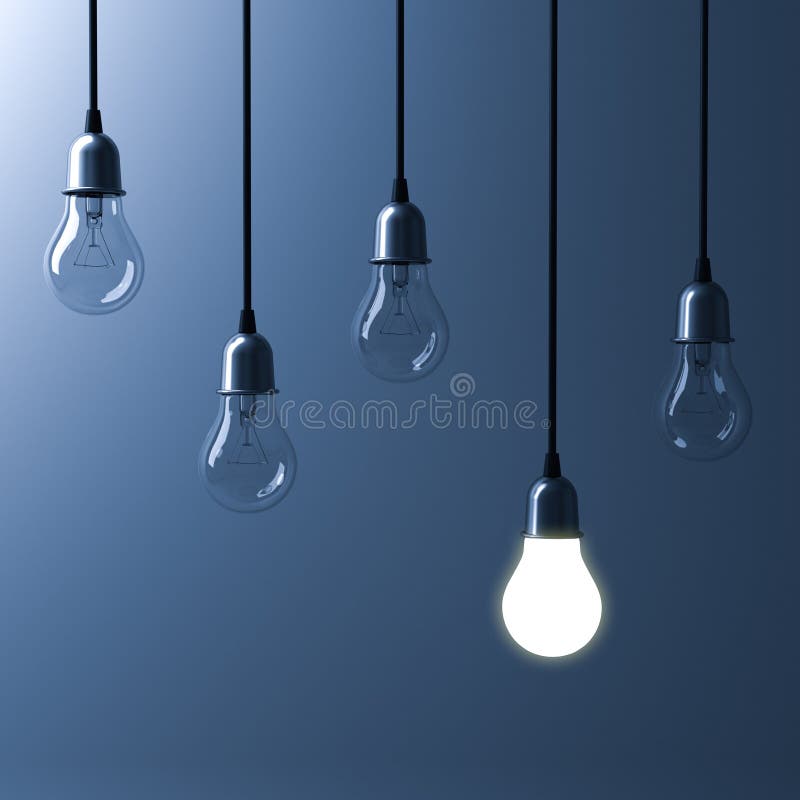 One Hanging Light Bulb Glowing Different and Stand Out from Unlit ...