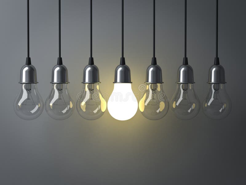 One Hanging Light Bulb Glowing Different and Stand Out from Unlit ...
