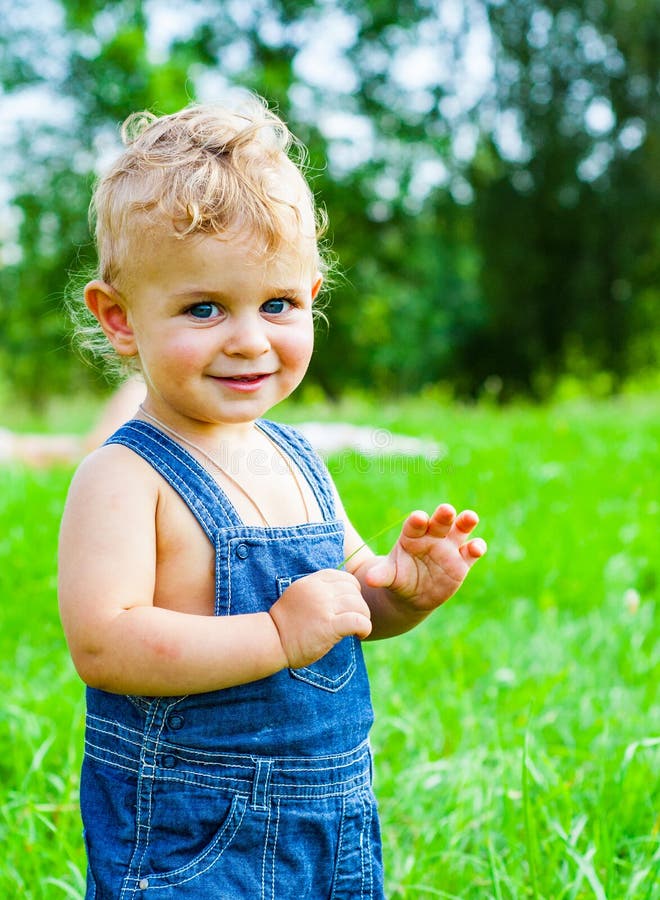 One happy baby boy in park stock image. Image of person - 122900231