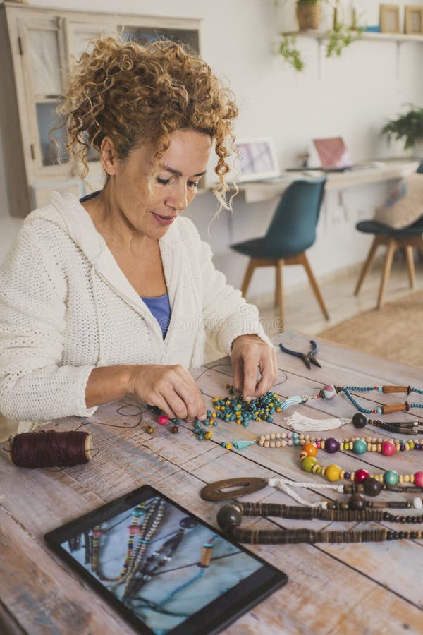One Happy Woman Working with Beads and Cords To Make Necklace and ...