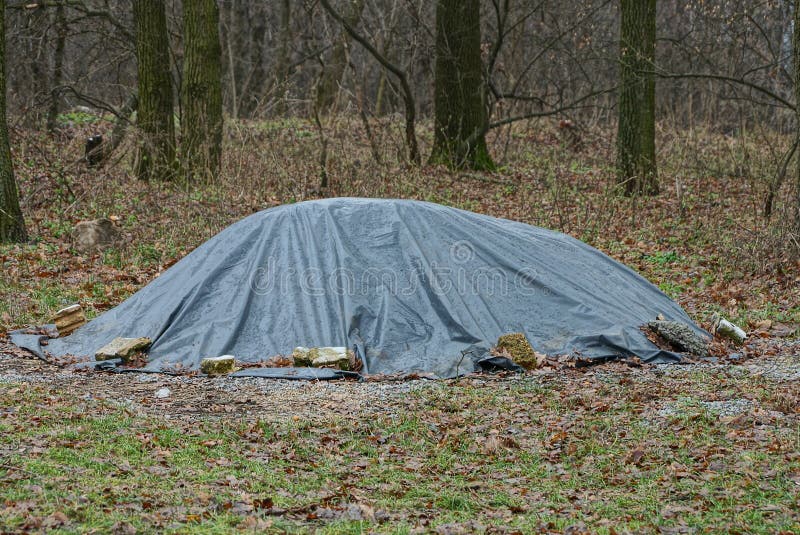 One Haystack Covered with Black Plastic Cellophane Stock Photo - Image ...