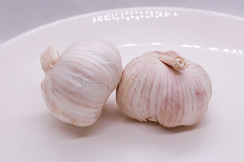 One Head of Garlic with Peel Stock Photo - Image of spice, cooking ...