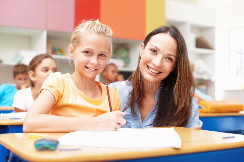 One of Her Brightest Students. Portrait of an Attractive Young Teacher ...