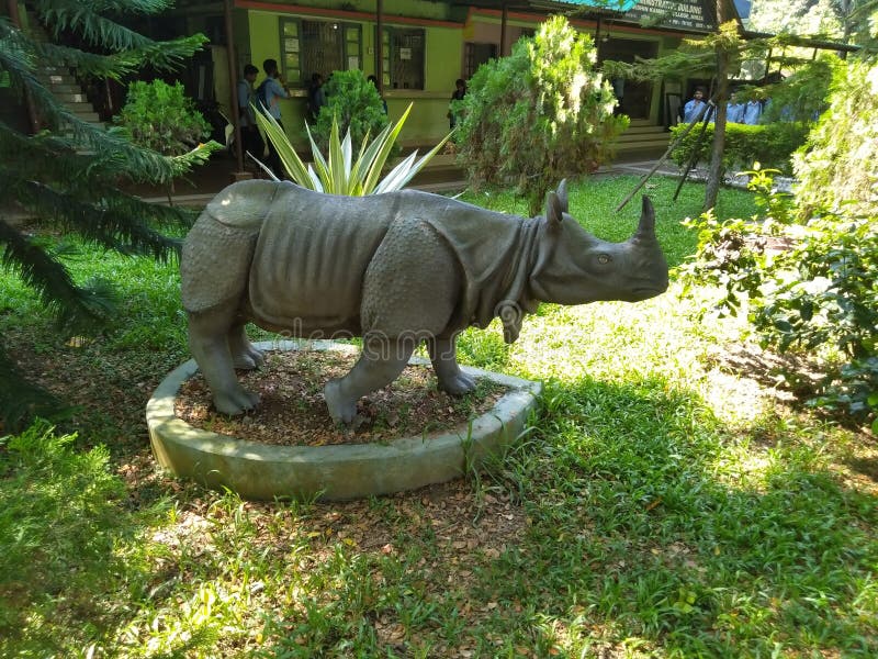 A one horned rhino statue editorial photography. Image of animal ...