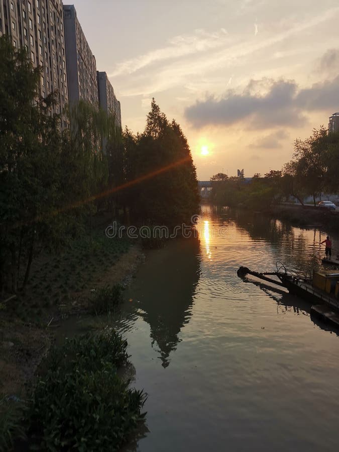 One Hot Summer Day - Sunset Over the River Stock Photo - Image of ...