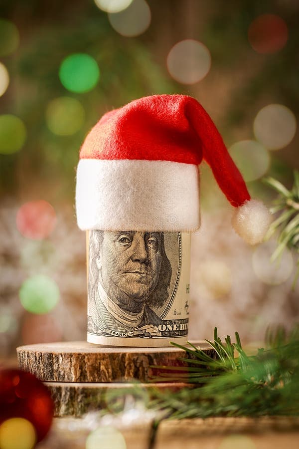 One Hundred Dollars Banknote with Snowman in a Red Cap Stock Photo ...