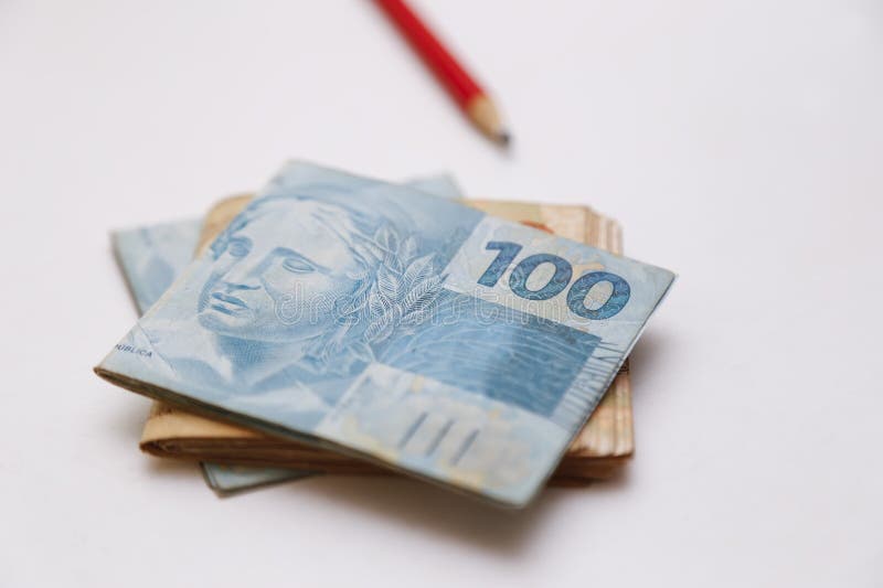 One Hundred Real Notes and Other Notes on the Table with Pencil Stock ...