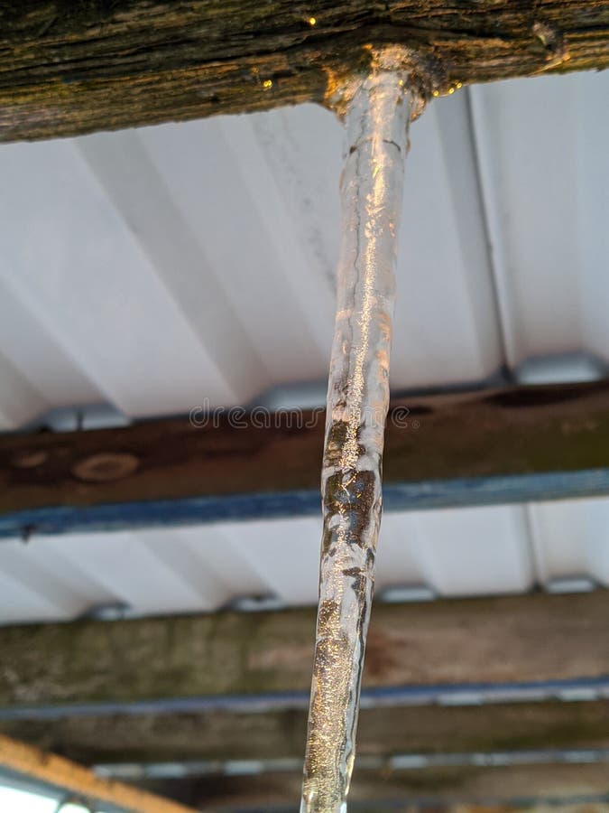One Icicle in Which the Light and Rays of the Sun are Reflected. Stock ...