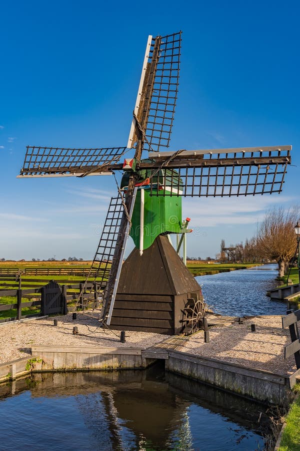 Windmill Isolated on the Water Stock Image - Image of rural, nature ...