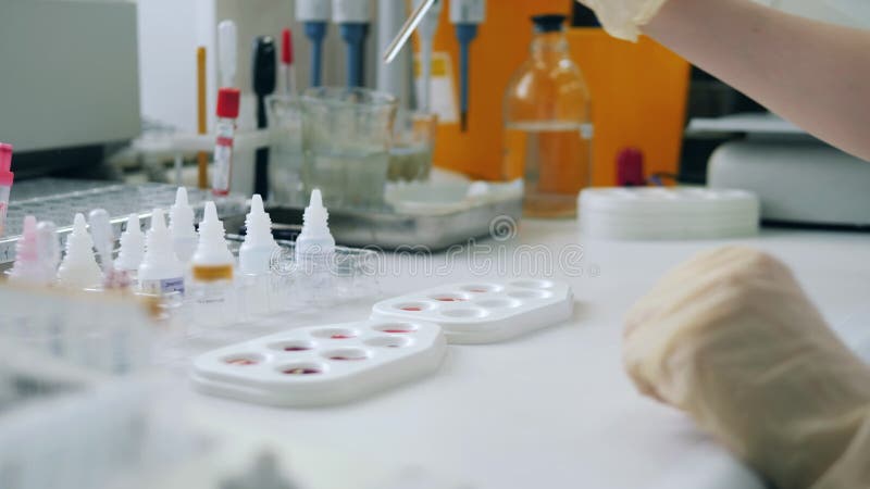 One Laboratory Worker Tests Samples on a Pallete. Stock Video - Video ...