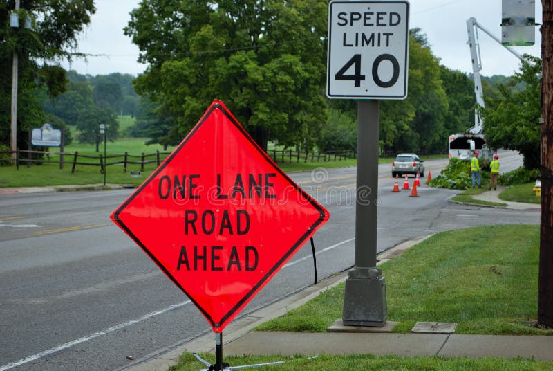 One Lane Road Ahead Construction Sign on the Side of a Five Lane Road ...