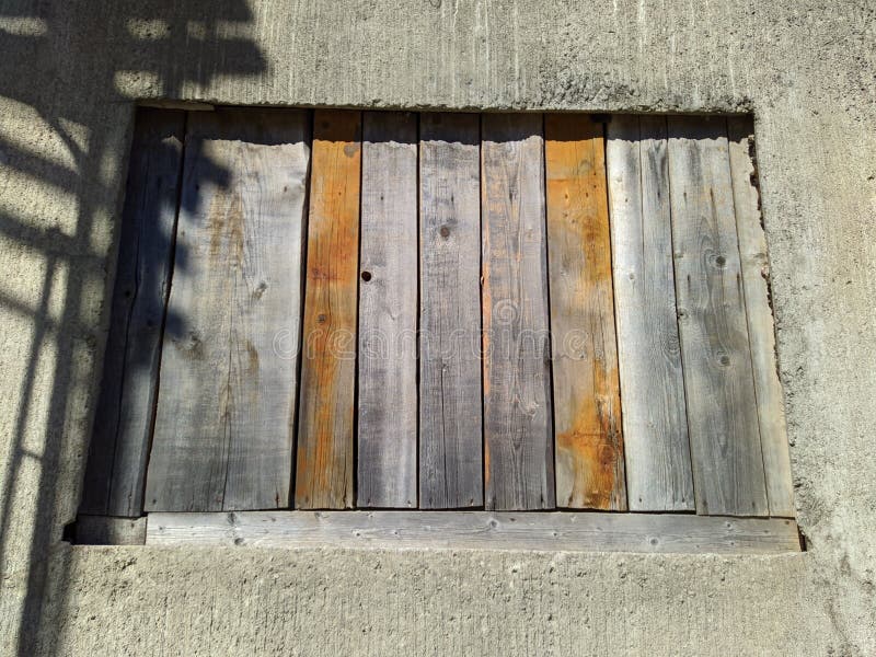 One Large Boarded Up Window in the Daytime. Stock Photo - Image of ...