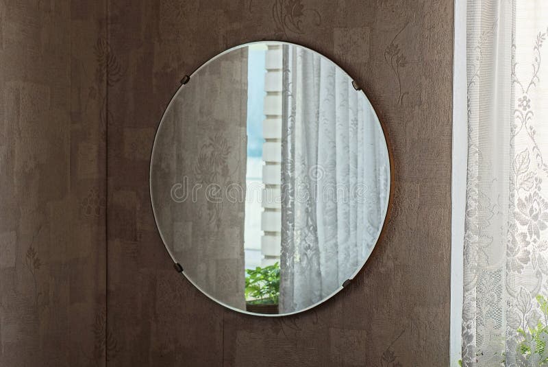 One Large Round Glass Mirror with Reflection Stock Image - Image of ...