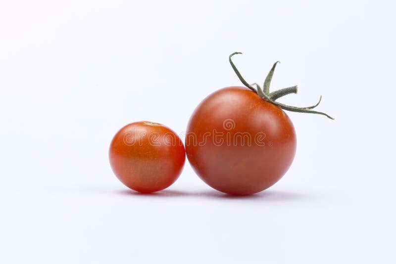 One Large and One Small Charry Tomato Stock Image - Image of bright ...
