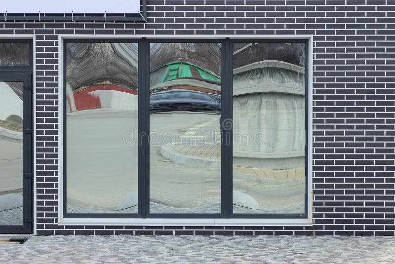 One Large Window on the Black Brick Wall of the House Stock Photo ...