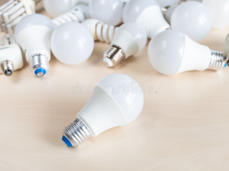 One LED Bulb Light and Many Different Lamps Stock Image - Image of ...