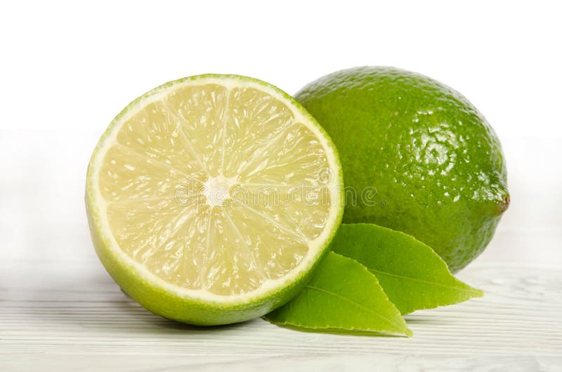 One Lemon with Half of Juicy Lime Stock Image - Image of color, fruit ...