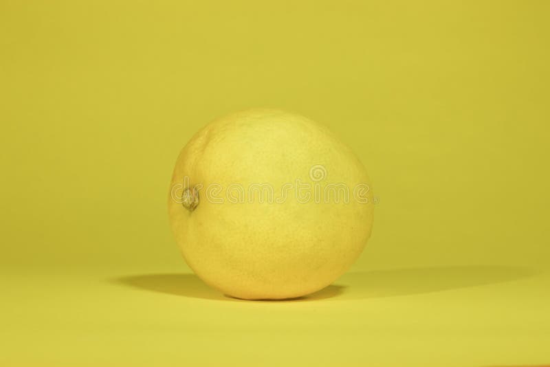 One Lemon on Yellow Background. Front View Stock Photo - Image of drop ...