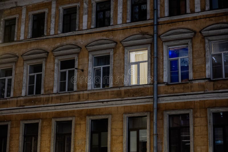 One Lighted Window on the Facade of the House Stock Image - Image of ...