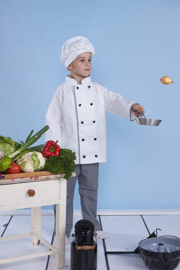 One Little Boy As Chef Cook Making Salad. Stock Image - Image of lunch ...