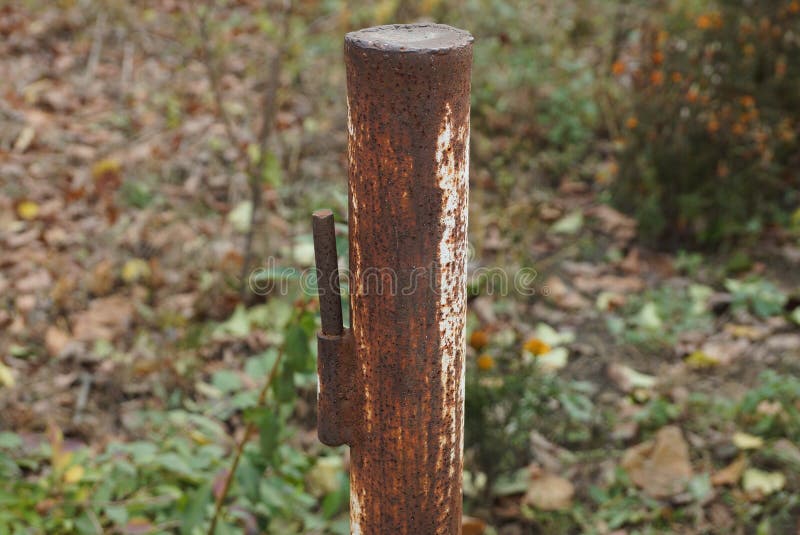 One Long Brown Rusty Iron Post Stock Photo - Image of equipment, pipe ...