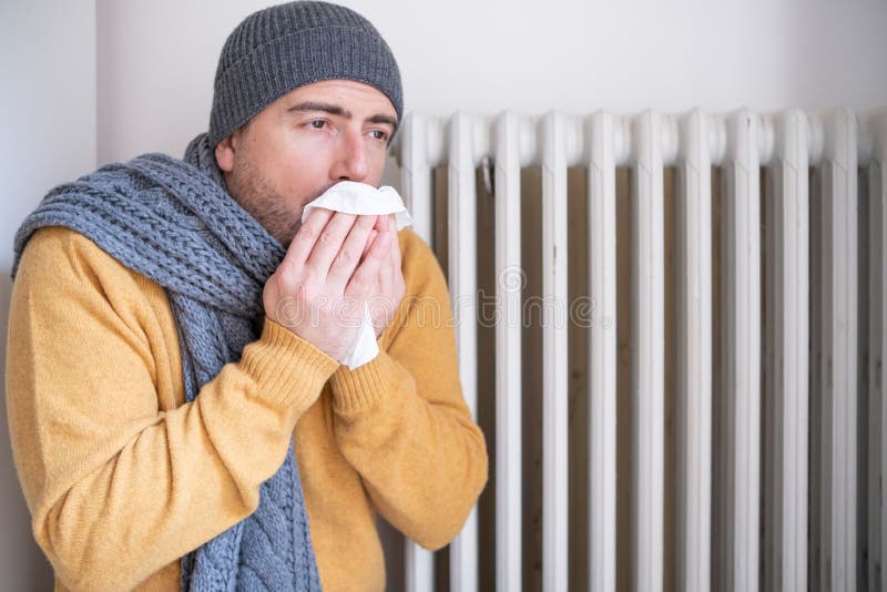 One Man Feeling Cold at Home after Home Heating Trouble Stock Photo ...