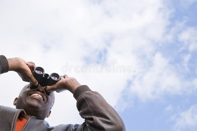 One Man Looking through Binoculars Stock Image - Image of enjoyment ...