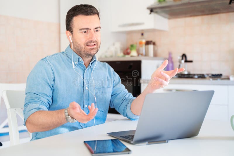 One Man Making a Business Video Call in the Kitchen at Home Stock Image ...