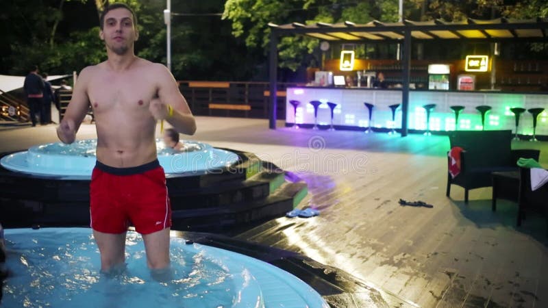 One Man in Red Shorts is Dancing on a Pool at the Stock Footage - Video ...