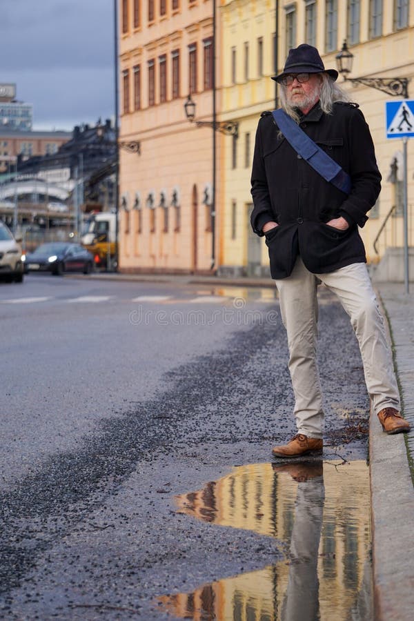 One Man Standing on Road in City Stock Image - Image of standing ...