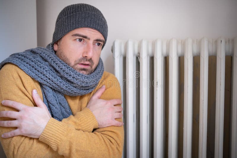 One Man Suffering Cold at Home and Problem with House Heating Stock ...