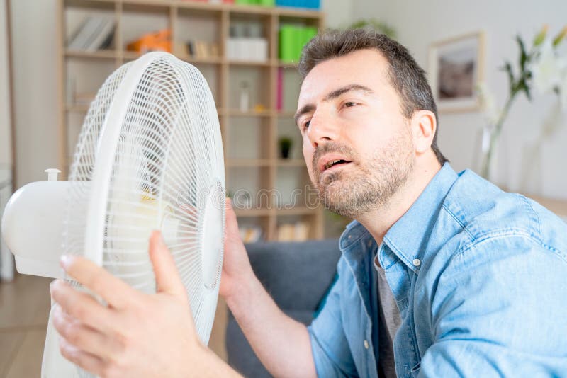 One Man Sweating Suffering Summer Heatwave Home Stock Photos - Free ...