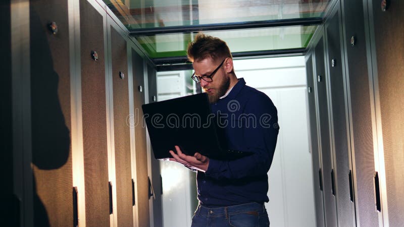 Computer Engineer Works at a Cryptocurrency Mining Farm. Stock Video ...