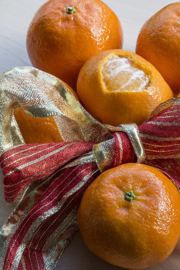 One Mandarin with Hole in Heart Form and Bow-knot Stock Image - Image ...