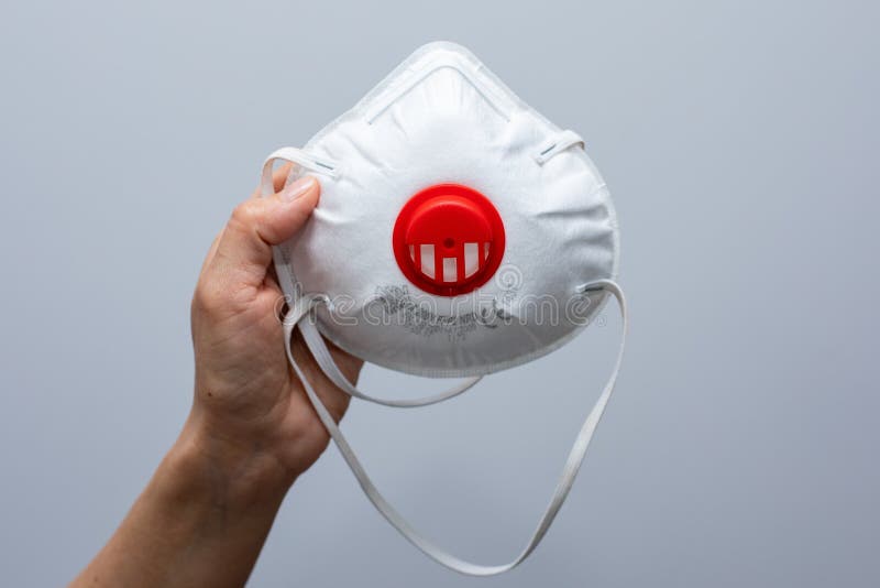 One Mask with Filter Held in the Hand Editorial Photography - Image of ...