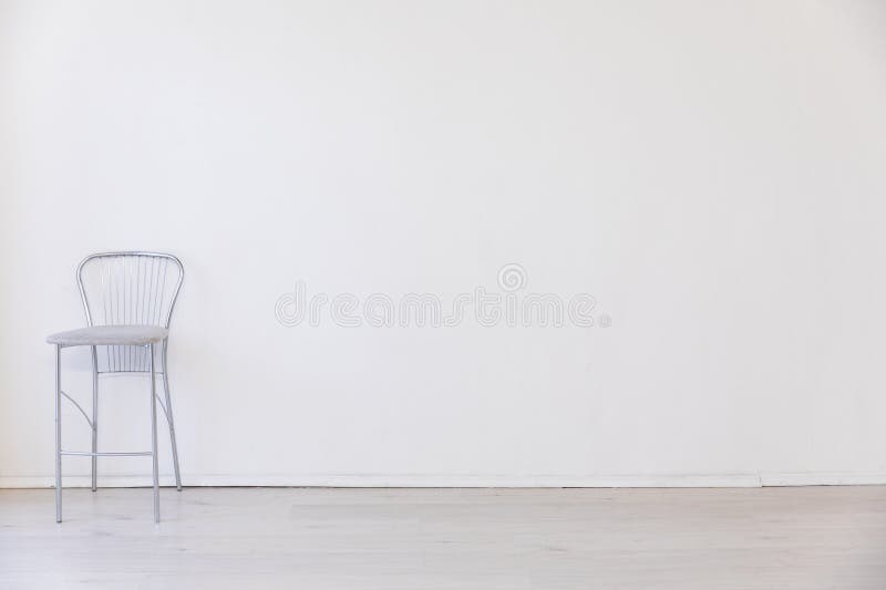 One Metal Bar Stool in the Interior Near a White Wall Stock Photo ...