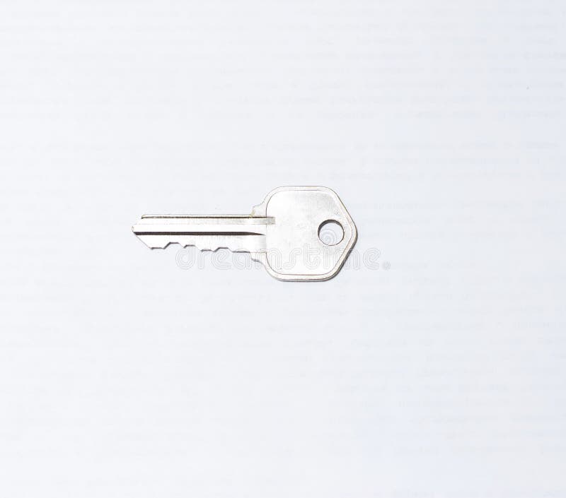 One Metal Flat Key Isolated on the White Background Stock Photo - Image ...