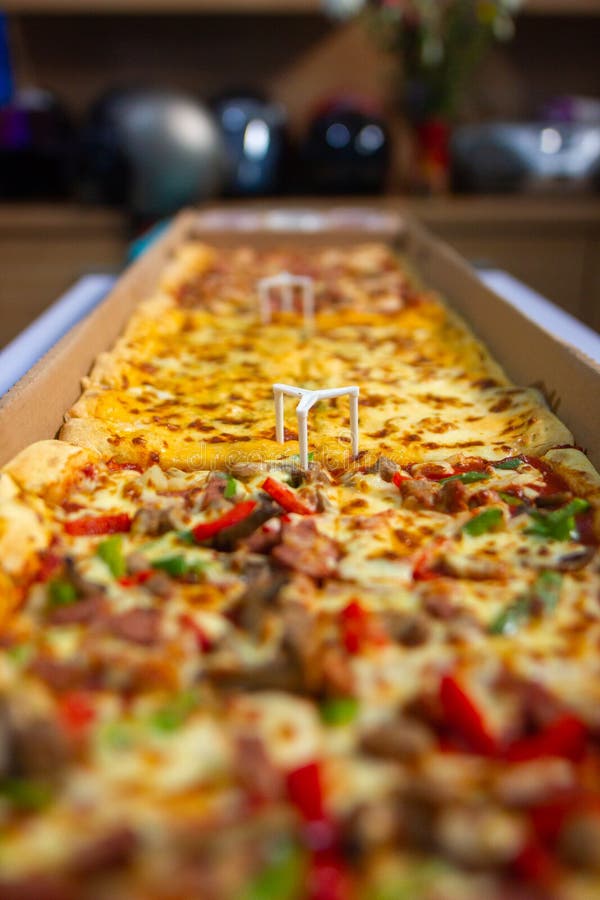 Long Pizza with Tomato Cheese Mozzarella Spicy Salami Mushrooms in ...