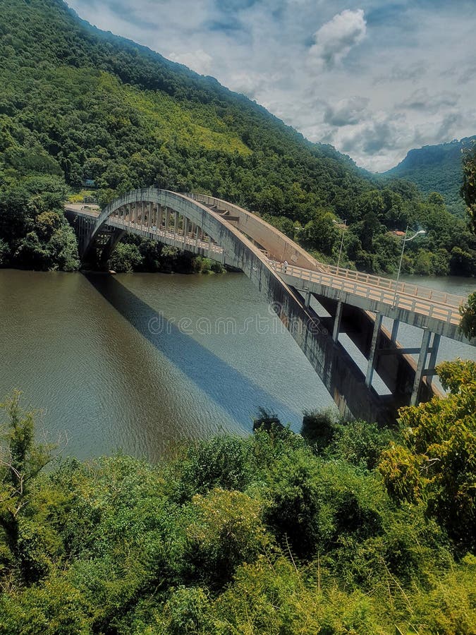 One of the Most Beautiful Bridge Structures Over a Dark, Flowing River ...