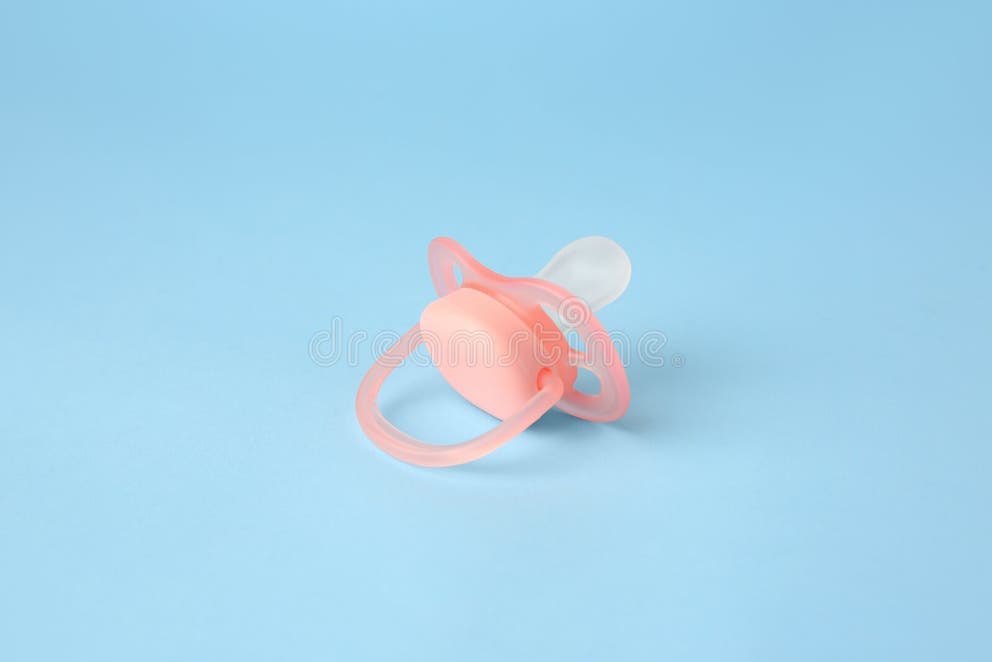 One New Baby Pacifier on Light Blue Background Stock Image - Image of ...