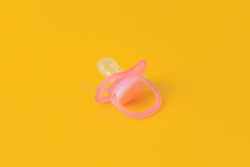 One New Baby Pacifier on Orange Background Stock Image - Image of ...