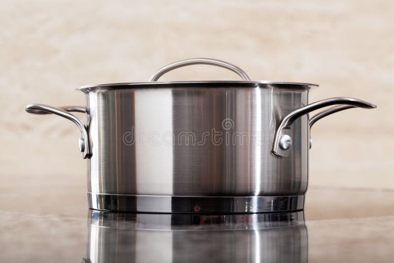 One New Metal Pot on Kitchen Top Stock Photo - Image of stainless ...
