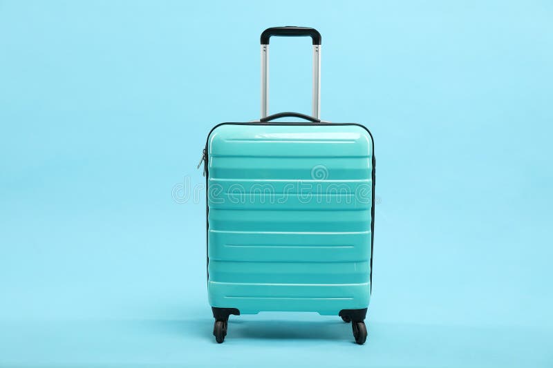 Turquoise Suitcase Standing. Concept of Tourism and Traveling Stock ...