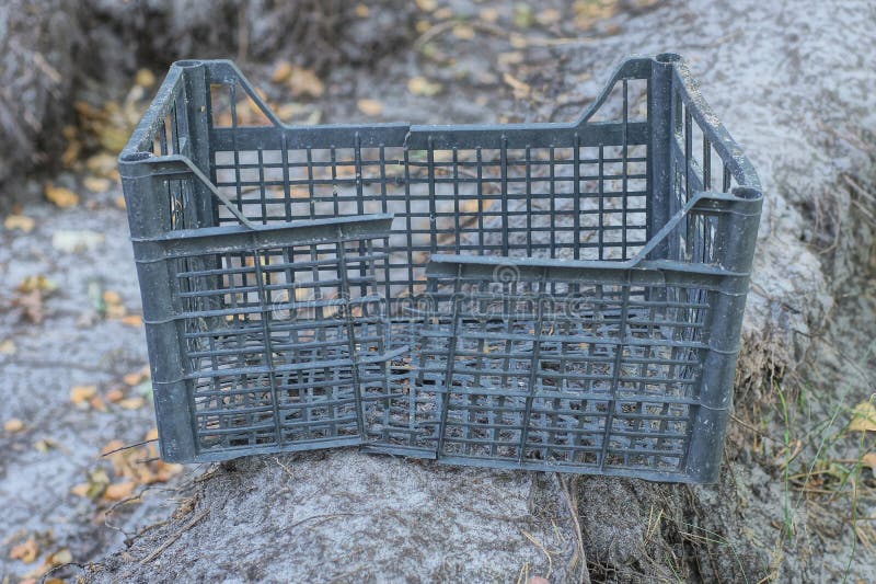 One Old Black Broken Plastic Box Stands on the Ground Stock Image ...