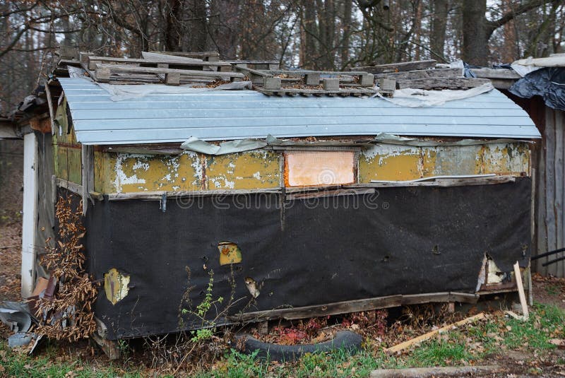 One Old Black Trailer with a Small Window Stands in Nature Stock Photo ...