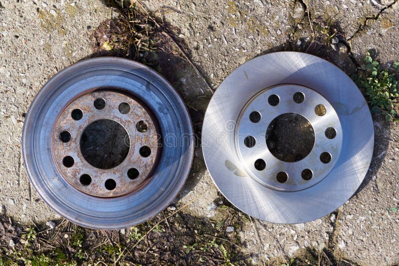 One Old Damaged and Another New Brake Discs Stock Photo - Image of ...