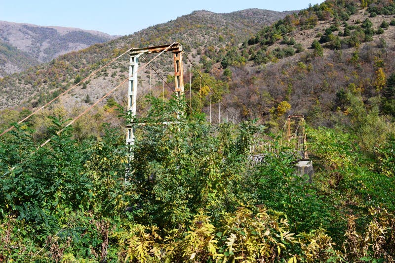 Old ruined wire bridge stock image. Image of plant, landscape - 129668975