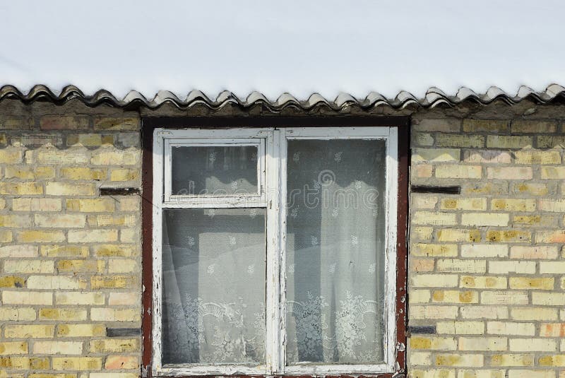 One Old Window on a Brown Brick Wall Under a Roof Stock Image - Image ...